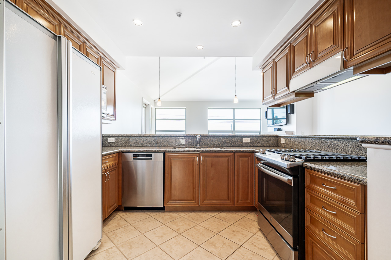 #205 – 2418 Marine Drive » Eric Christiansen