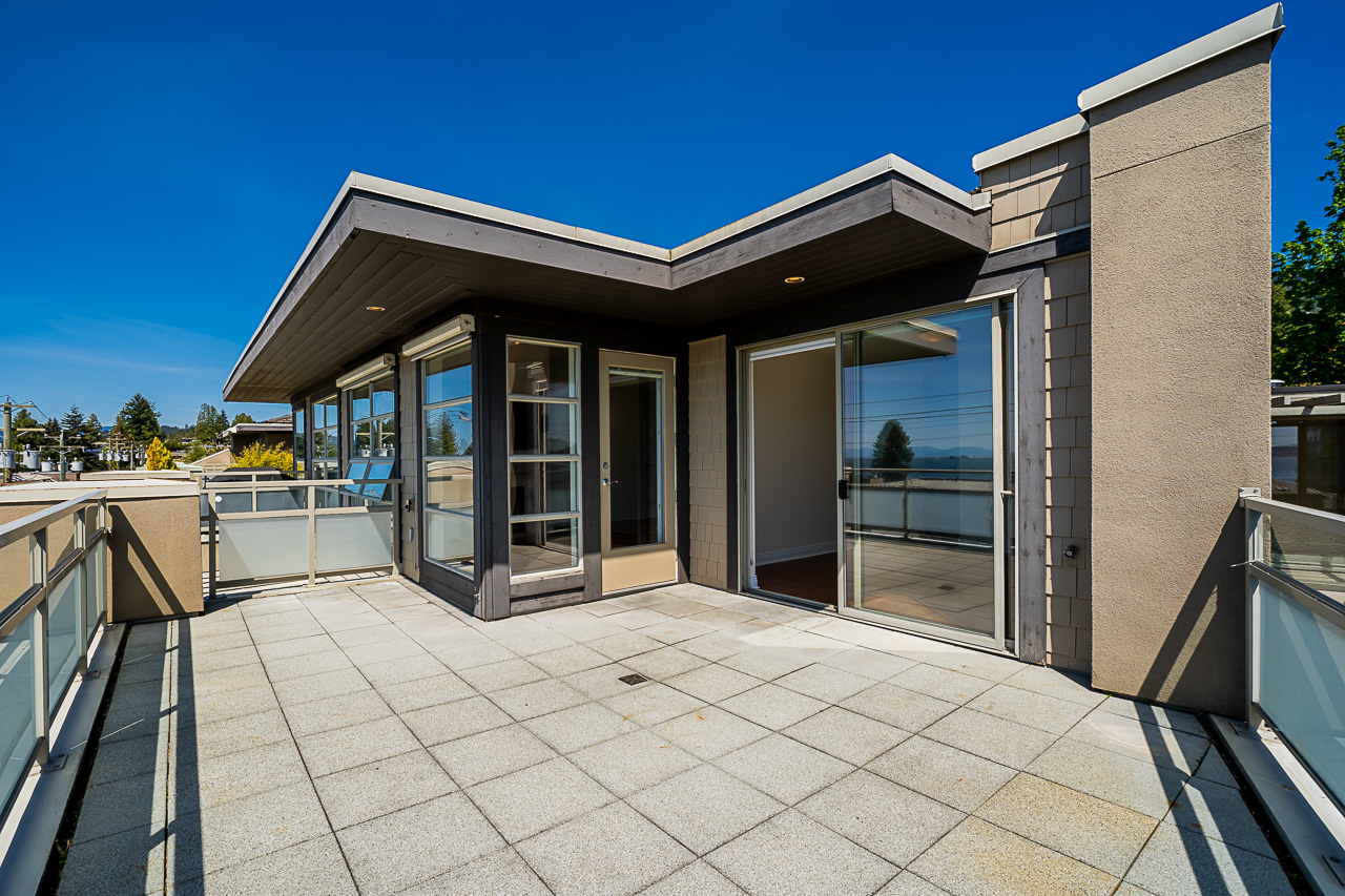 #205 – 2418 Marine Drive » Eric Christiansen