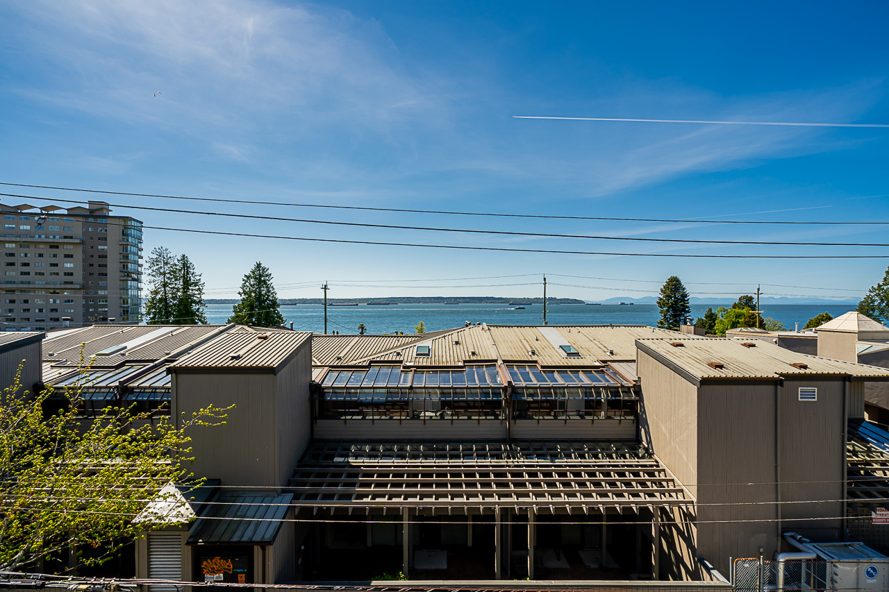 #205 – 2418 Marine Drive » Eric Christiansen